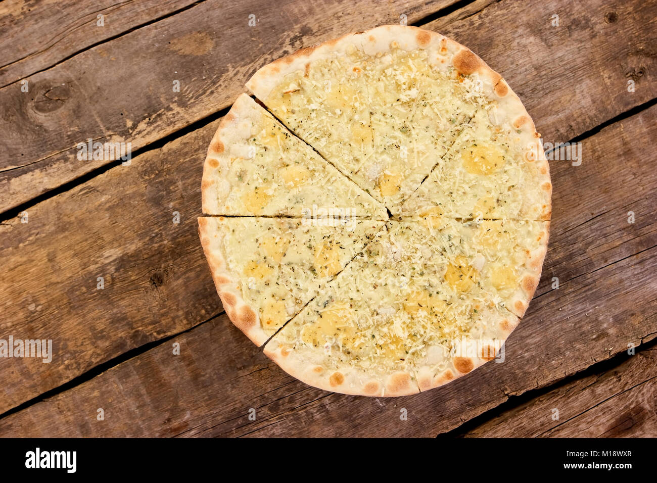 Eight slices of cheese pizza Stock Photo - Alamy