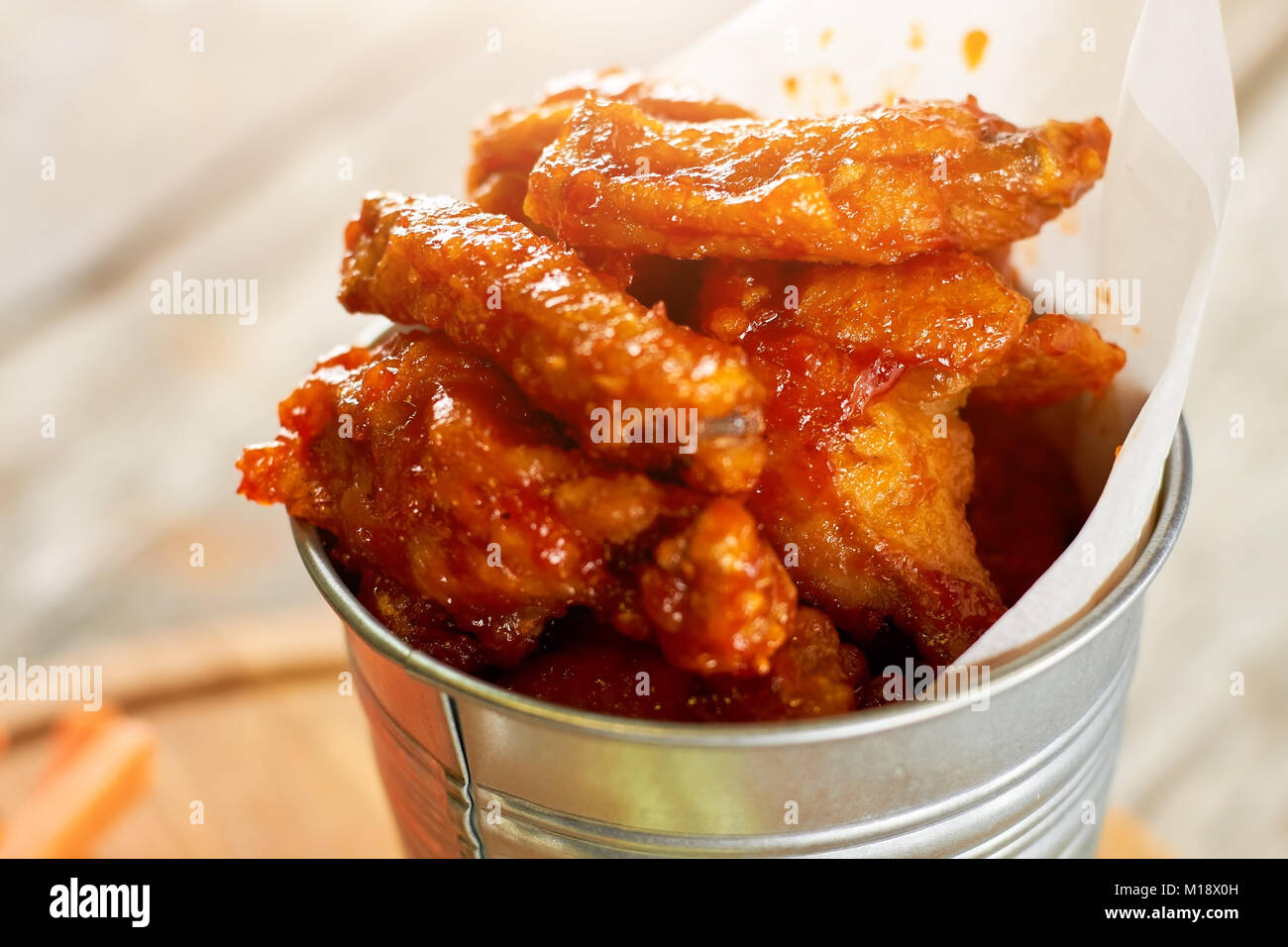 Juicy fried chicken meat pieces in sause, close up Stock Photo - Alamy