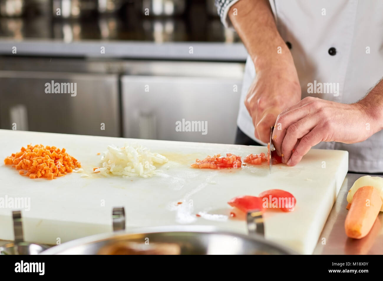 Vegetables chopping, piles of chopped vegetables Stock Photo - Alamy