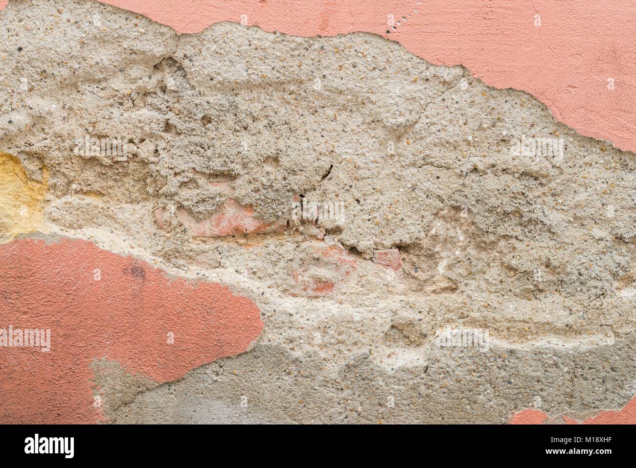 House wall with flaking plaster Stock Photo - Alamy