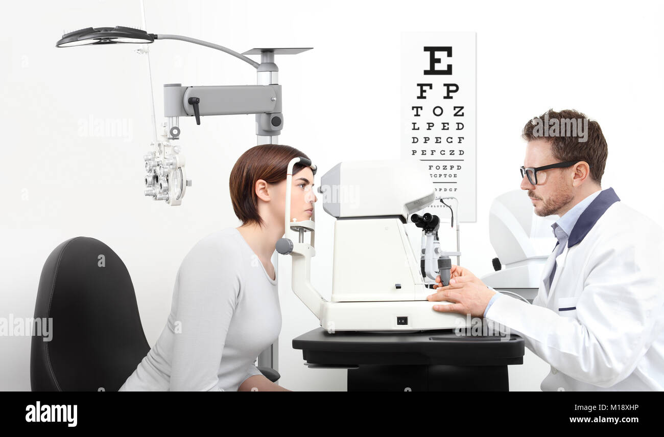 optometrist examining eyesight patient in optician office on white background Stock Photo - Alamy