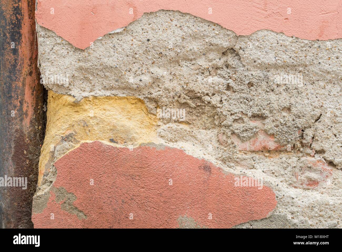 House wall with flaking plaster Stock Photo - Alamy