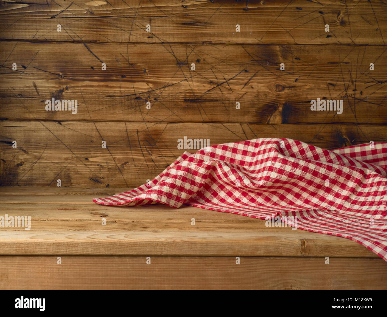 Empty wooden table with red checked tablecloth. Kitchen rustic ...