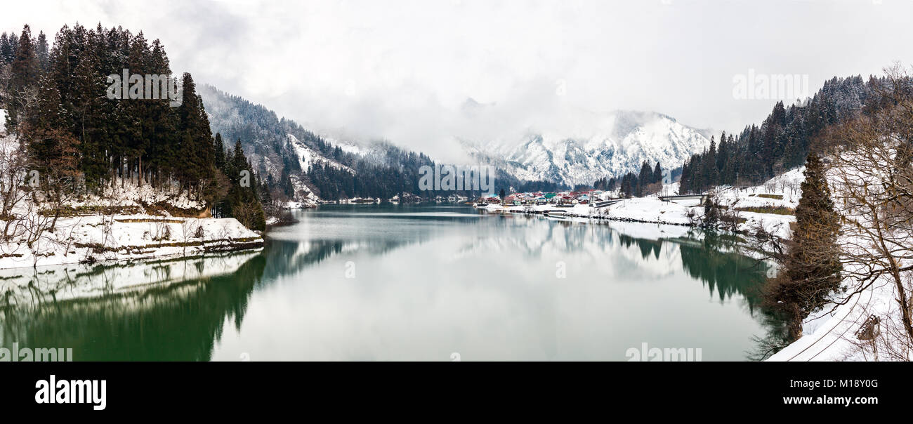 Train in Winter landscape snow on bridge Stock Photo - Alamy