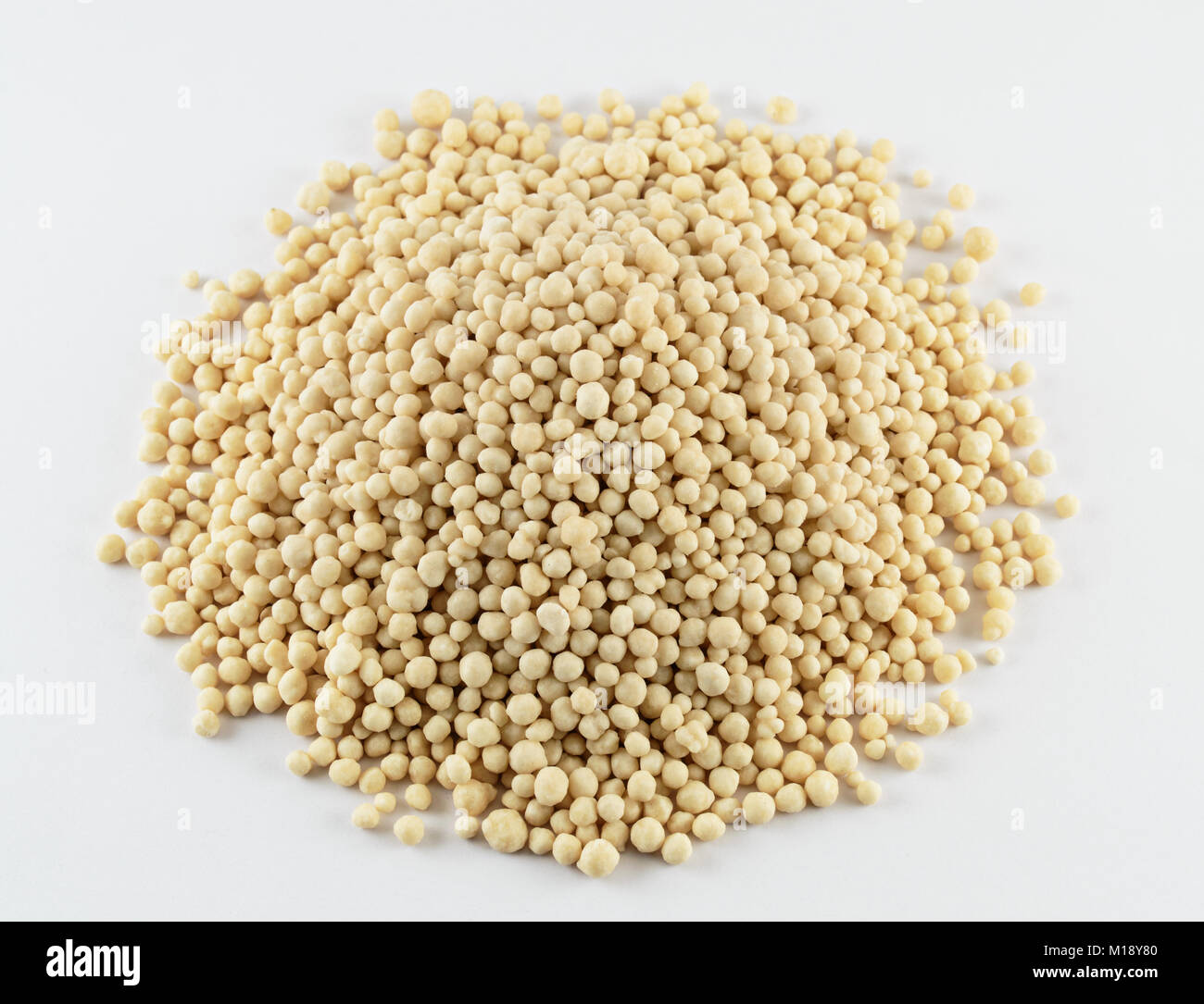 Heap of composite mineral fertilizers. Top view Stock Photo - Alamy