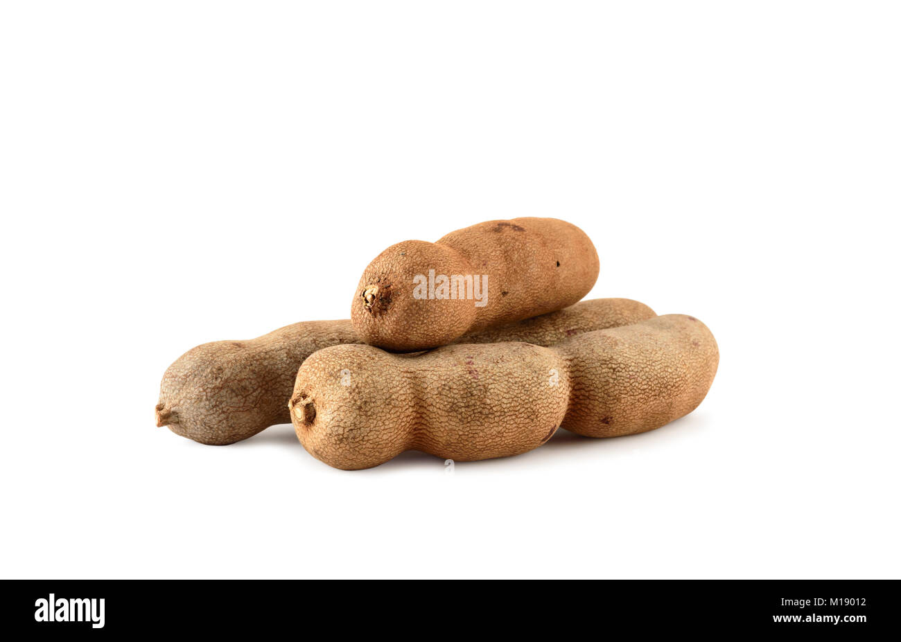Sweet tamarind closeup isolated on white background Stock Photo - Alamy