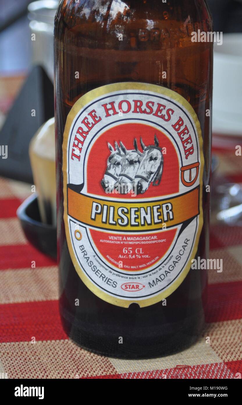 BOTTLE OF THREE HORSES PILSNER BEER (PRE 2014), MADAGASCAR Stock Photo ...