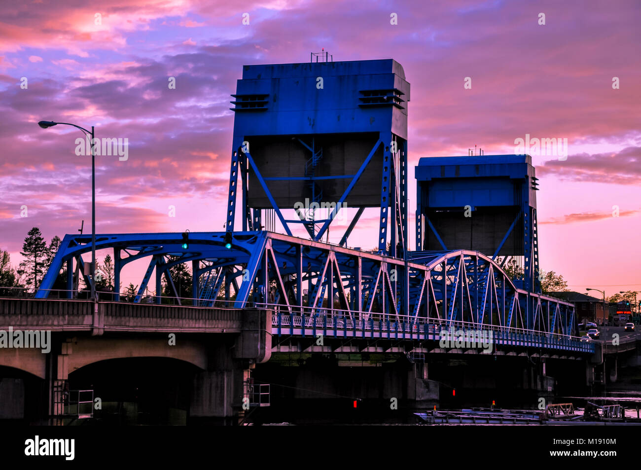Lewiston - Clarkston blue bridge against vibrant twilight sky Stock ...