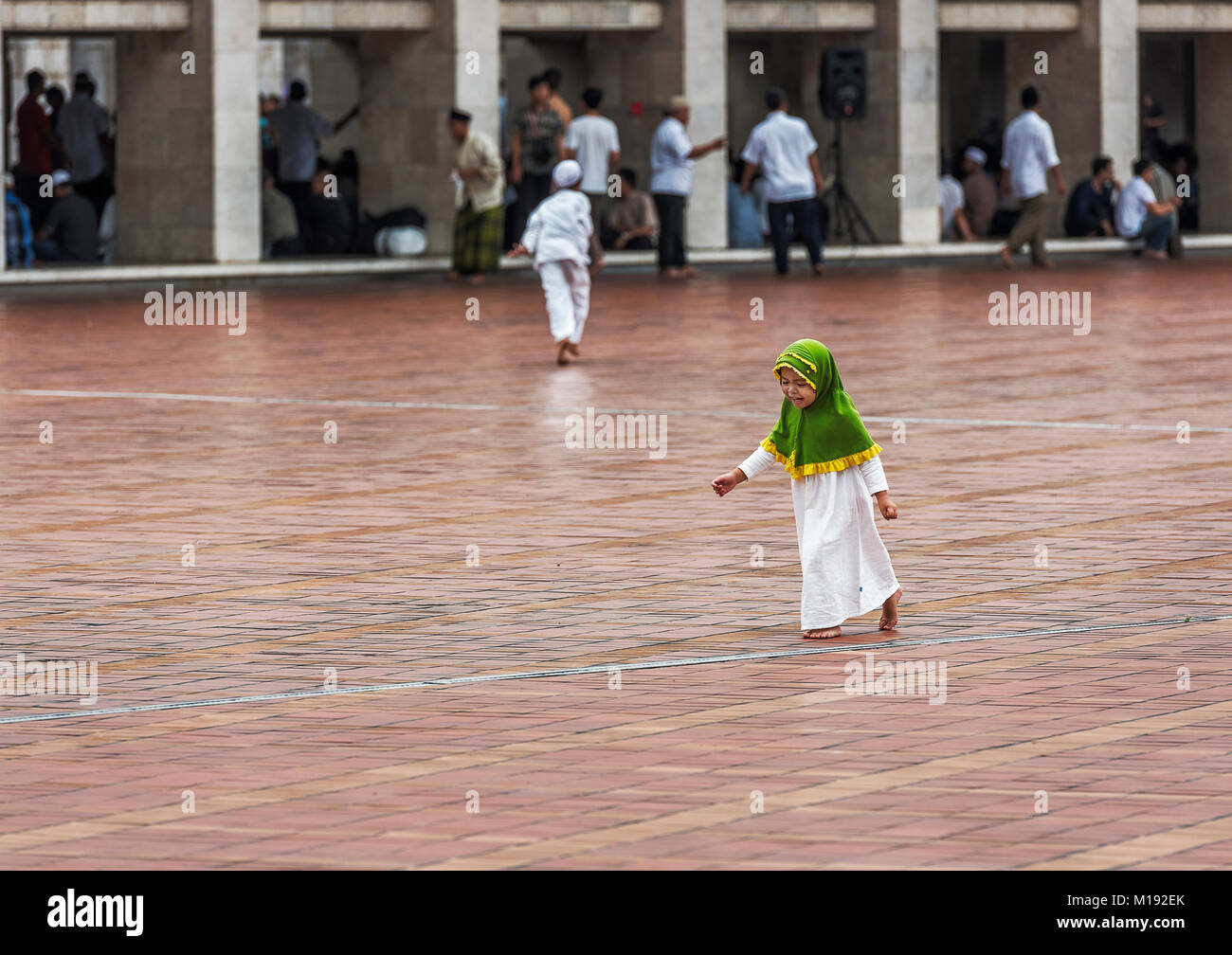 Children roaming around Istiqlal Mosque during the month of Ramadan ...