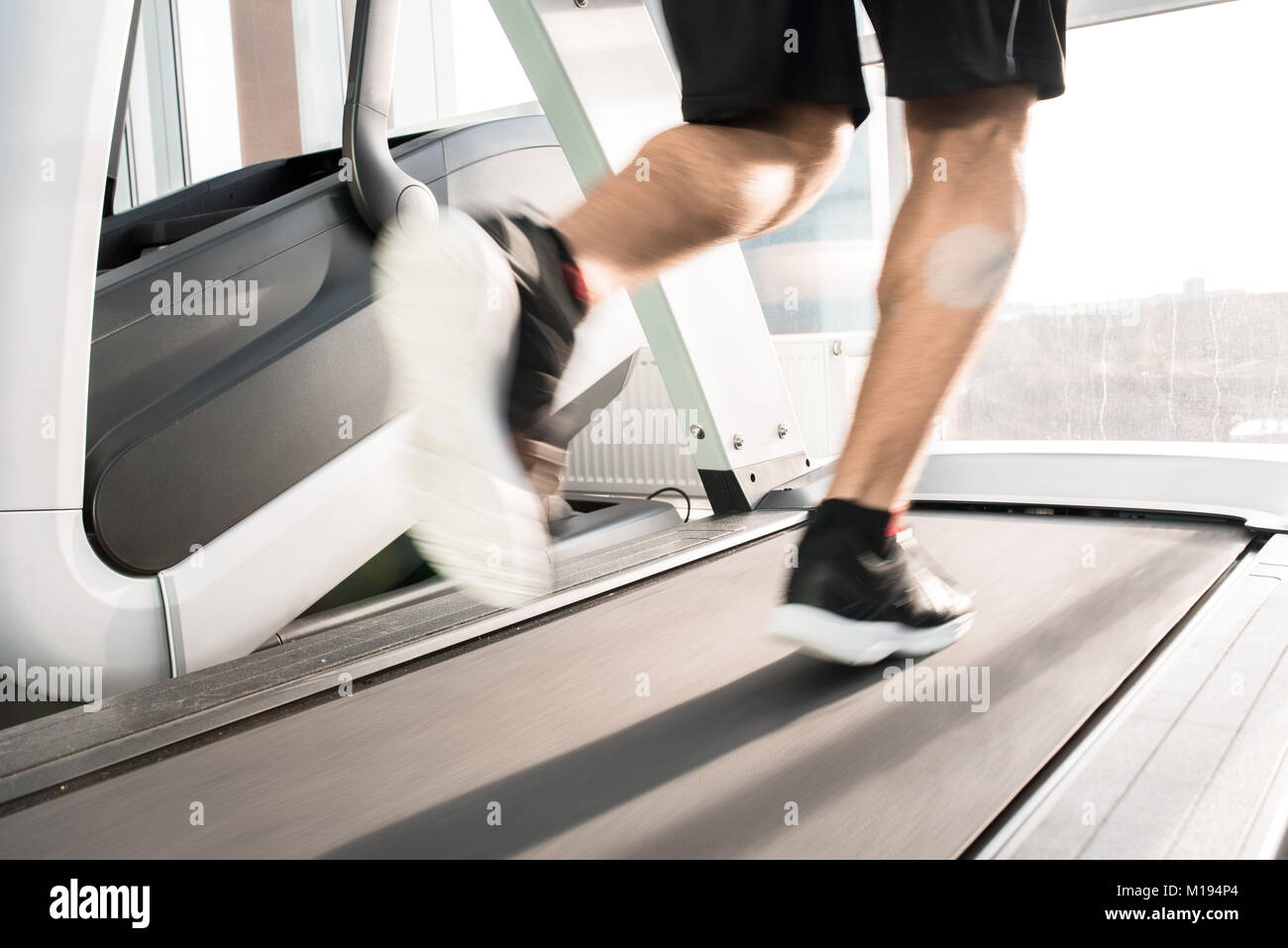 Unrecognizable Man Running on Treadmill Stock Photo - Alamy Unrecognizable Man Running on Treadmill Stock Photo - Alamy