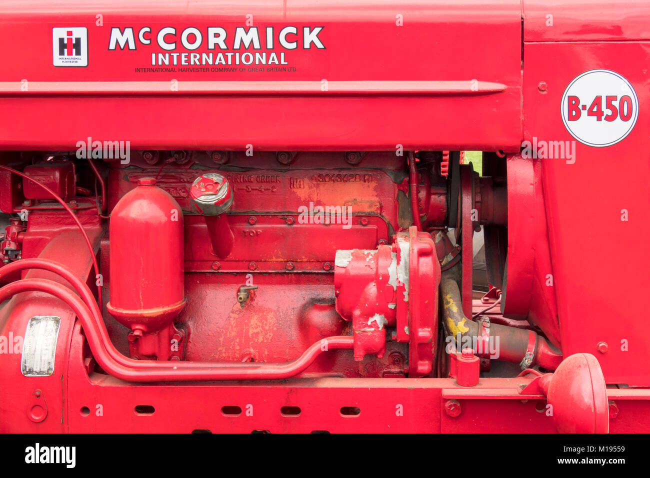 Side view detail showing the engine of a restored vintage McCormick ...