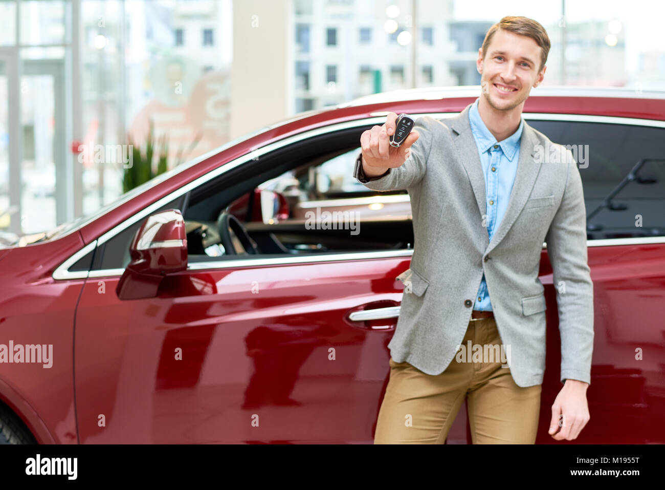 Happy presenting hi-res stock photography and images - Alamy