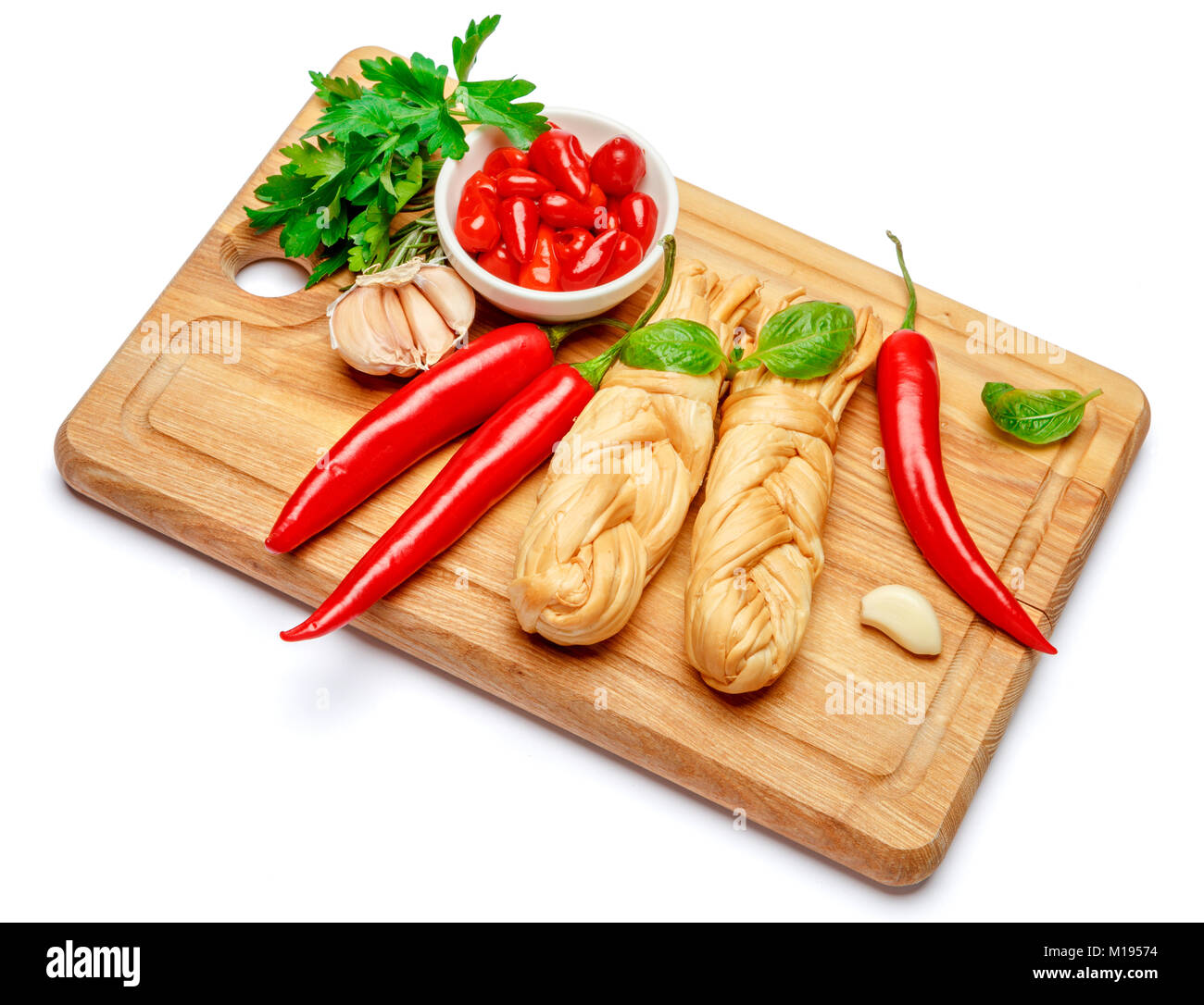 Smoked braided cheese and red pepper isolated on white background Stock ...