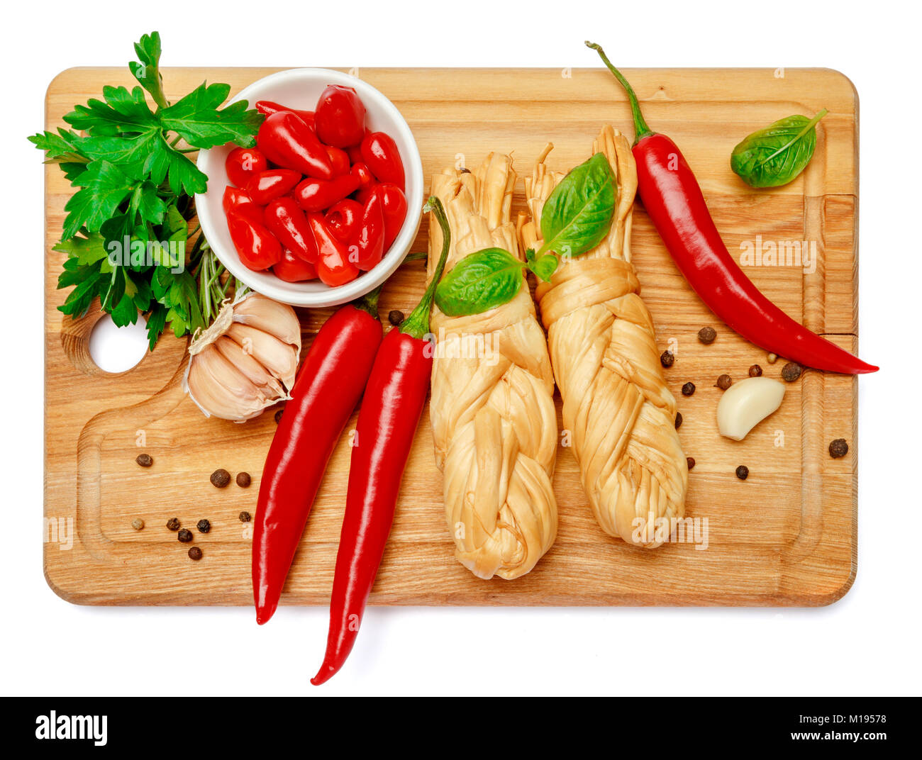 Smoked braided cheese and red pepper isolated on white background Stock ...