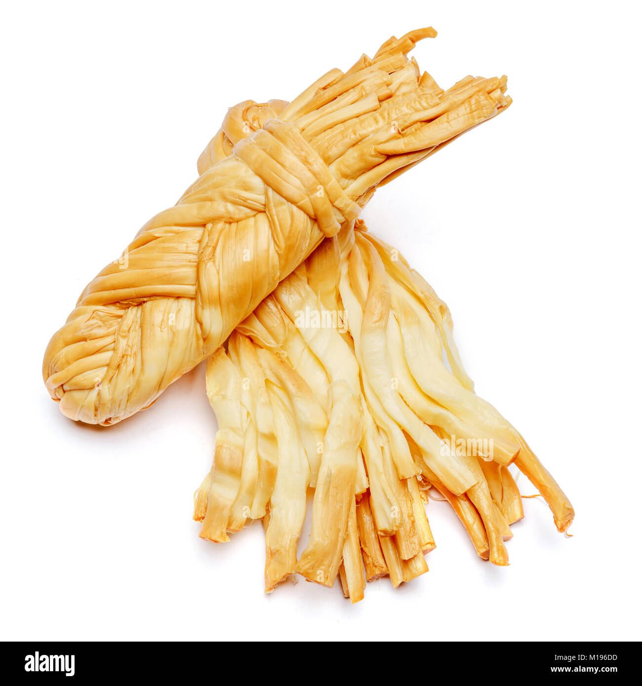 Smoked braided cheese isolated on white background Stock Photo - Alamy