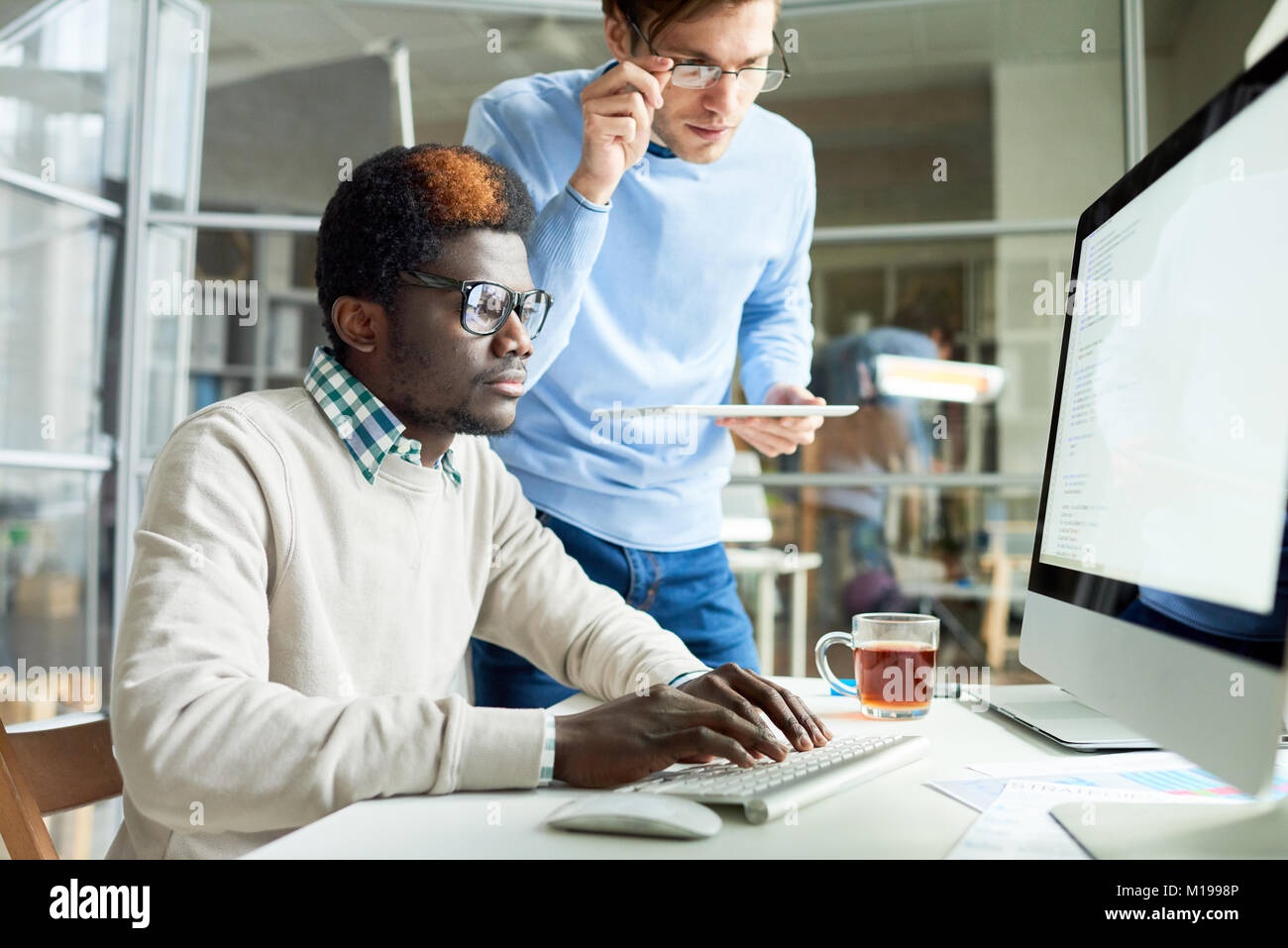 Web Developers Working on Code Stock Photo - Alamy