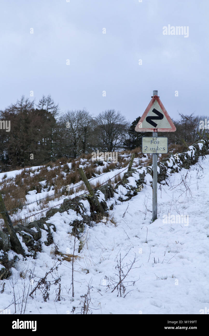 Bends in the road sign hi-res stock photography and images - Alamy