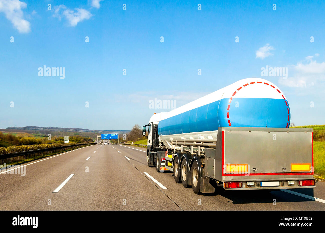 Big fuel gas tanker truck on highway Stock Photo - Alamy