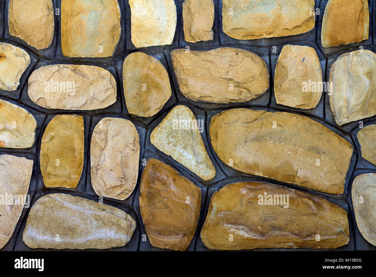 Different sizes of sand stones. Stone wall pattern background Stock ...