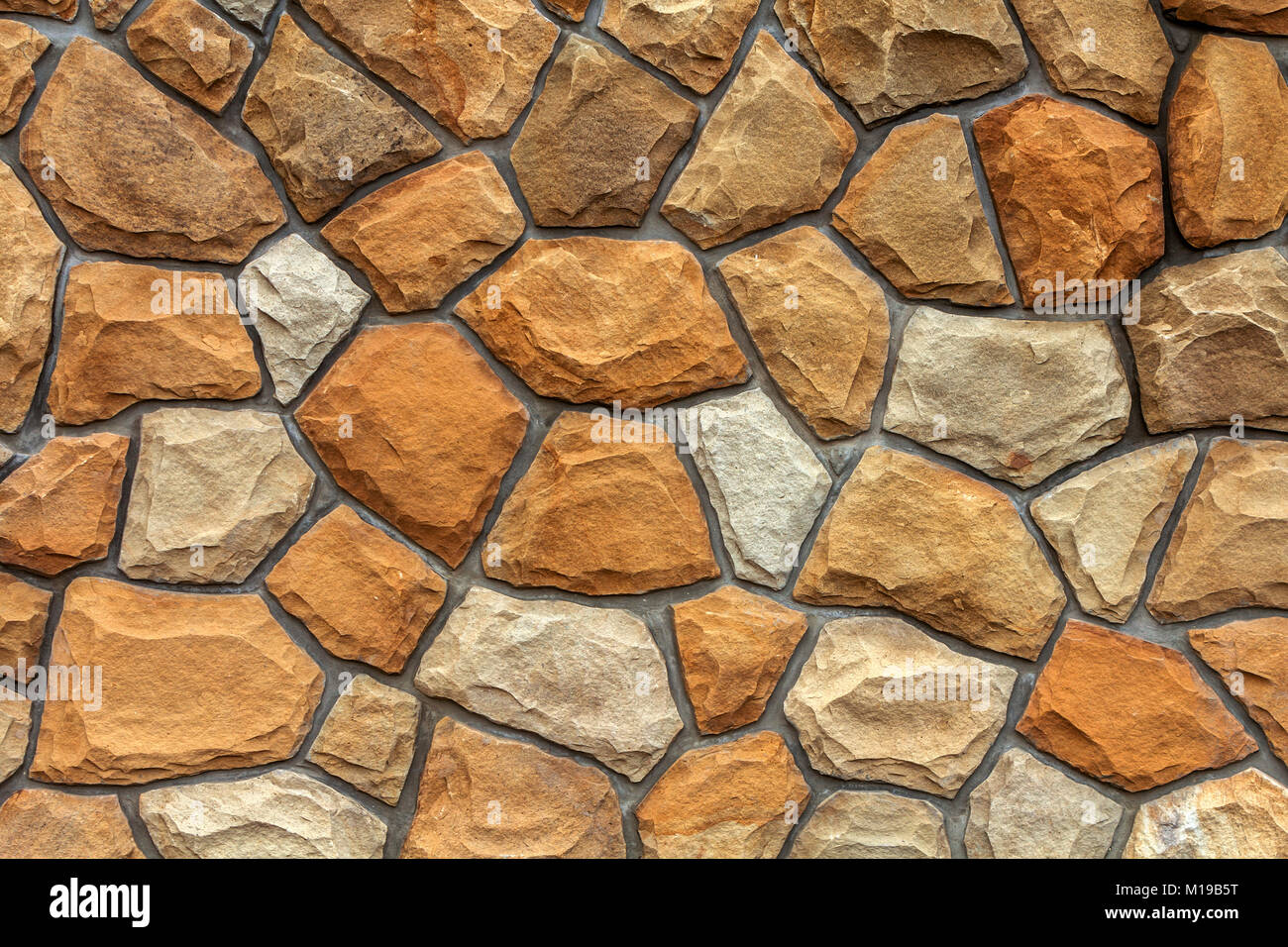 Different sizes of sand stones. Stone wall pattern background Stock ...