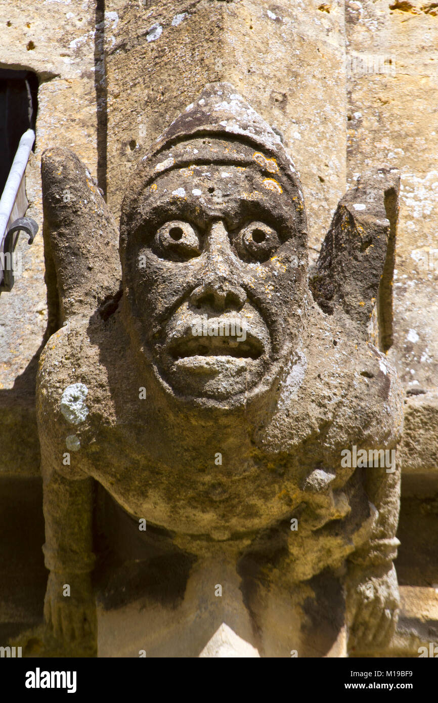 Grotesque gargoyles on the historic Cotswold church at Winchcombe ...
