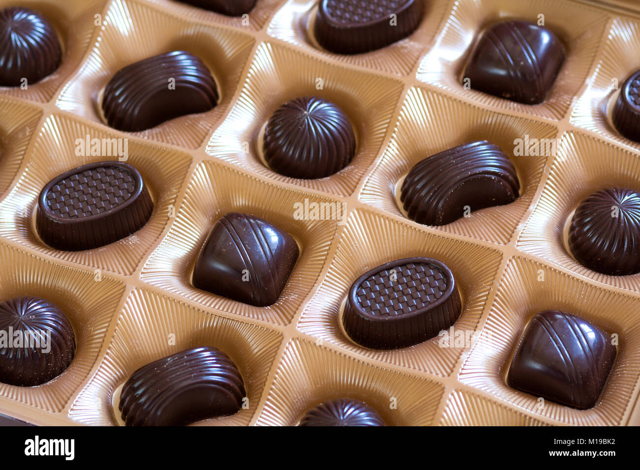 Sweet chocolate candies assortment in a box close-up. Top view Stock ...
