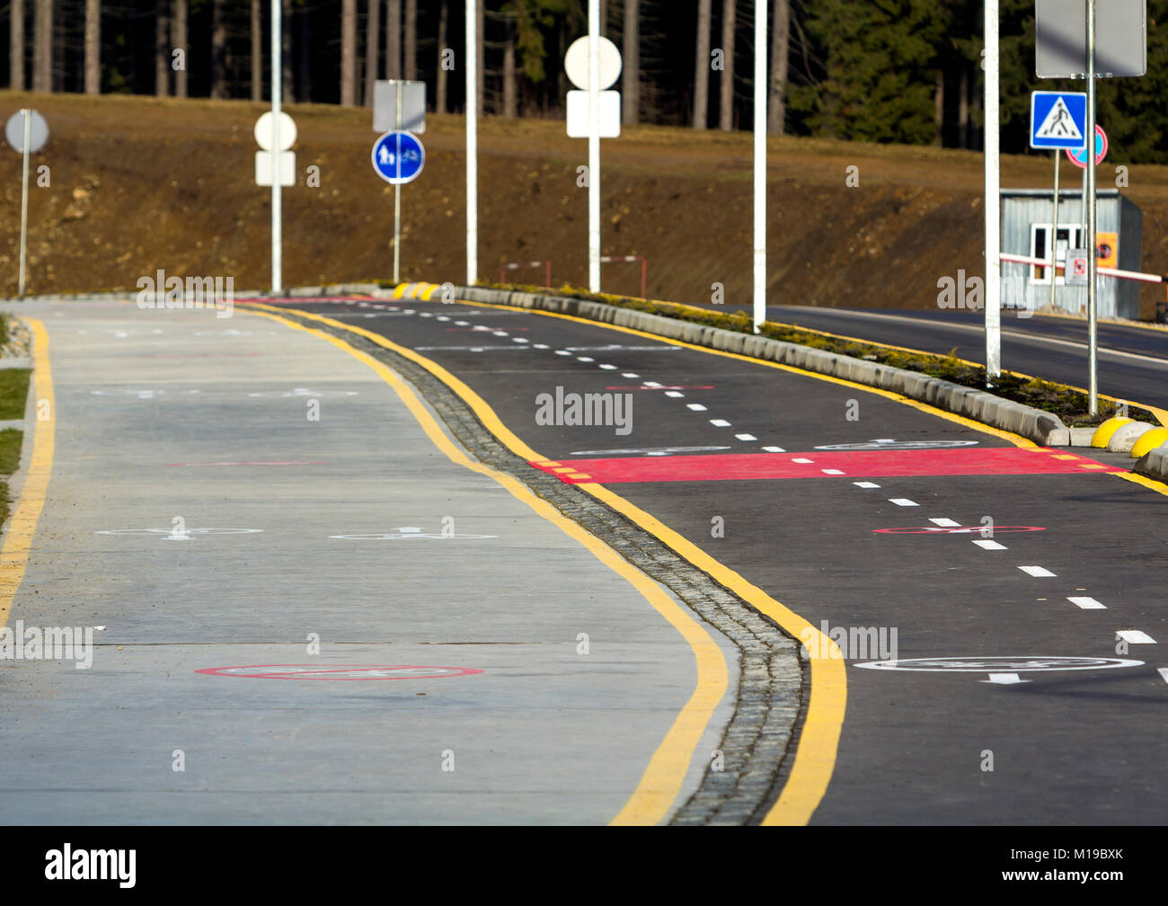 Walk way and bicycle lane signs on the asphalt road surface Stock Photo ...