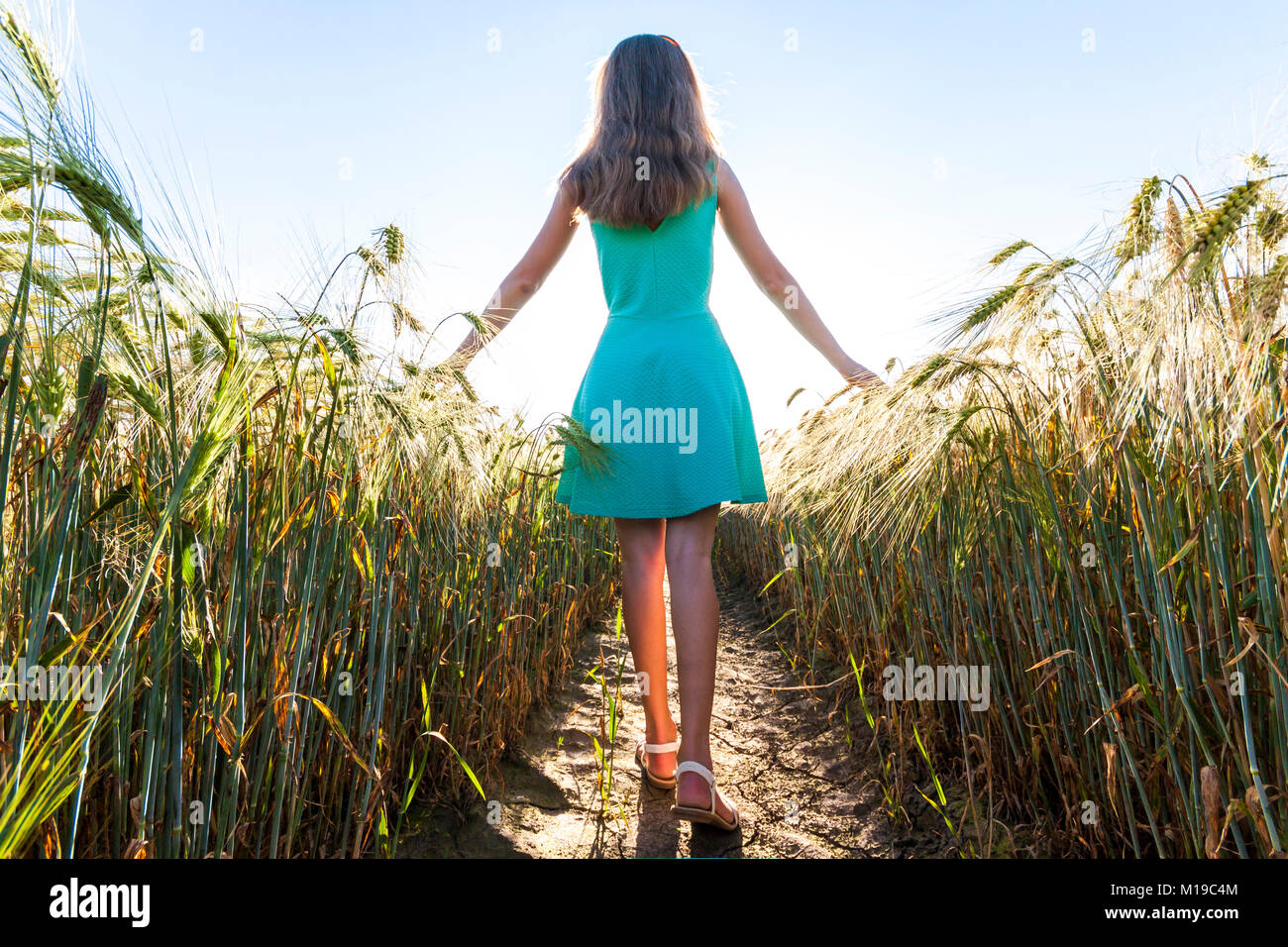 Beauty young girl outdoors enjoying nature. Beautiful teenage model ...