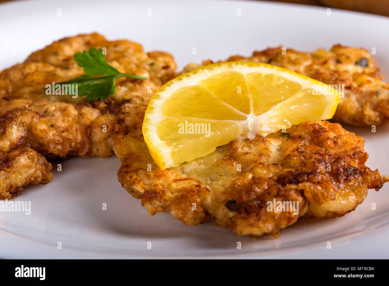 Viennese schnitzel on plate hi-res stock photography and images - Alamy
