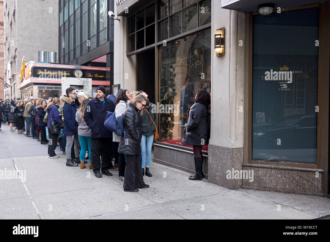 A long line of ticket holders wait to enter the Downton Abbey ...