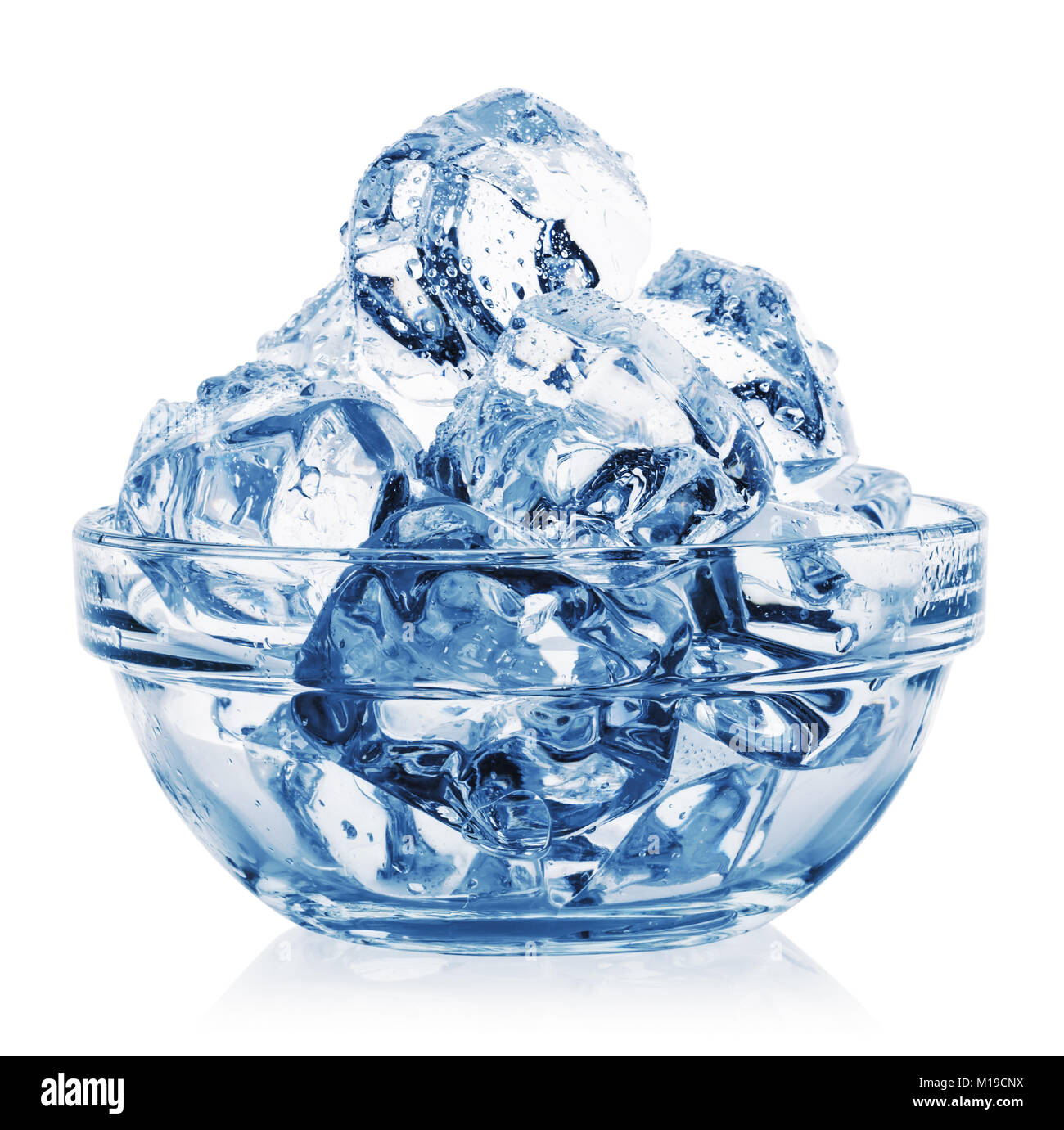 Cooling ice cubes in transparent plate isolated on a white background ...