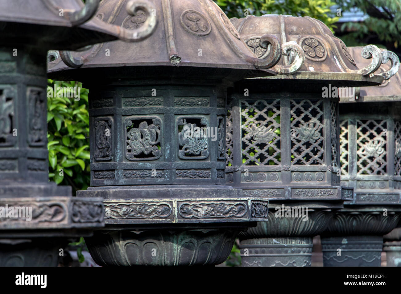 Stone lanterns in Ueno Park, Taito ward, Tokyo, Japan. Line of japanese ...