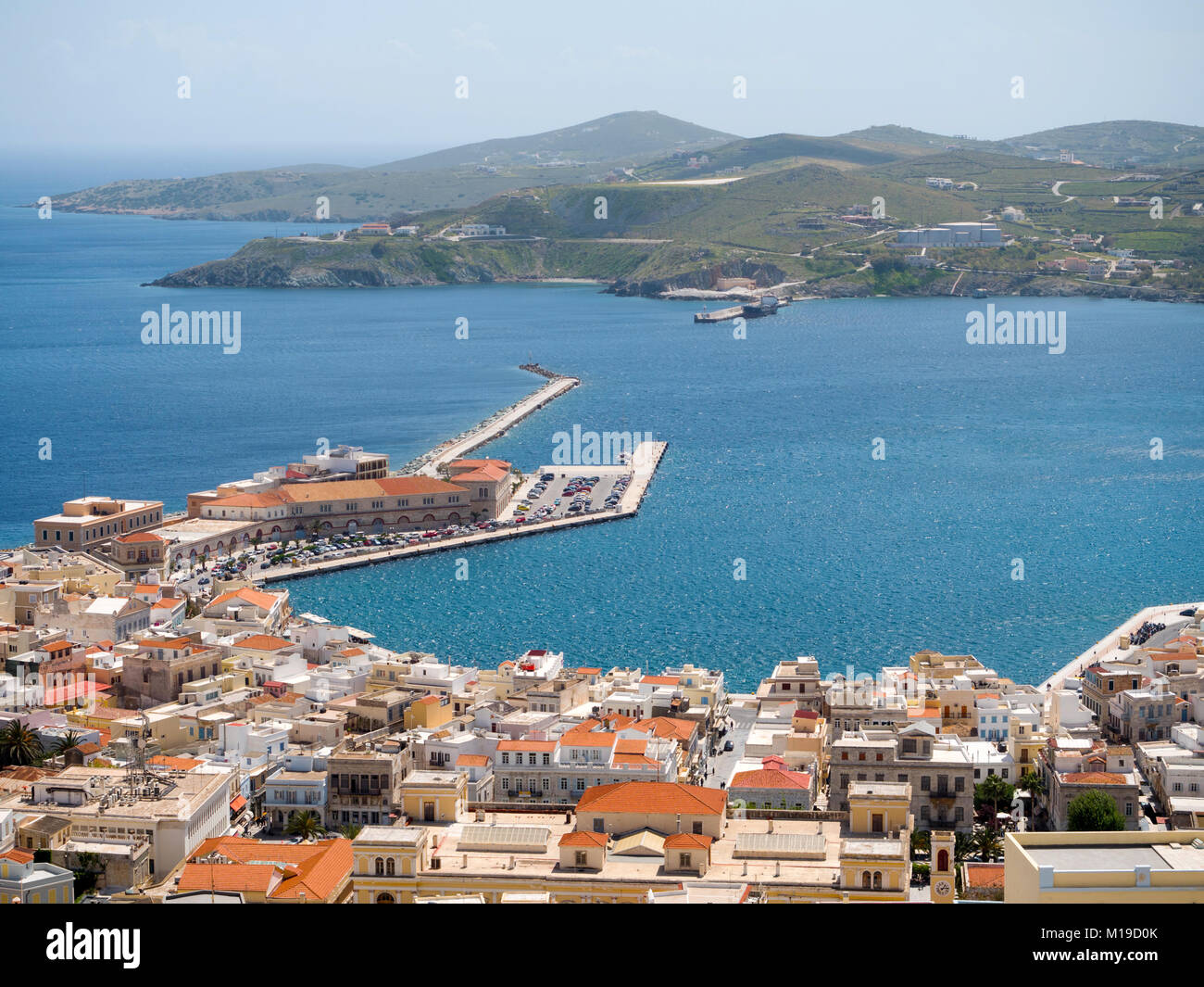View of Syros town and port with beautiful buildings and houses in a ...