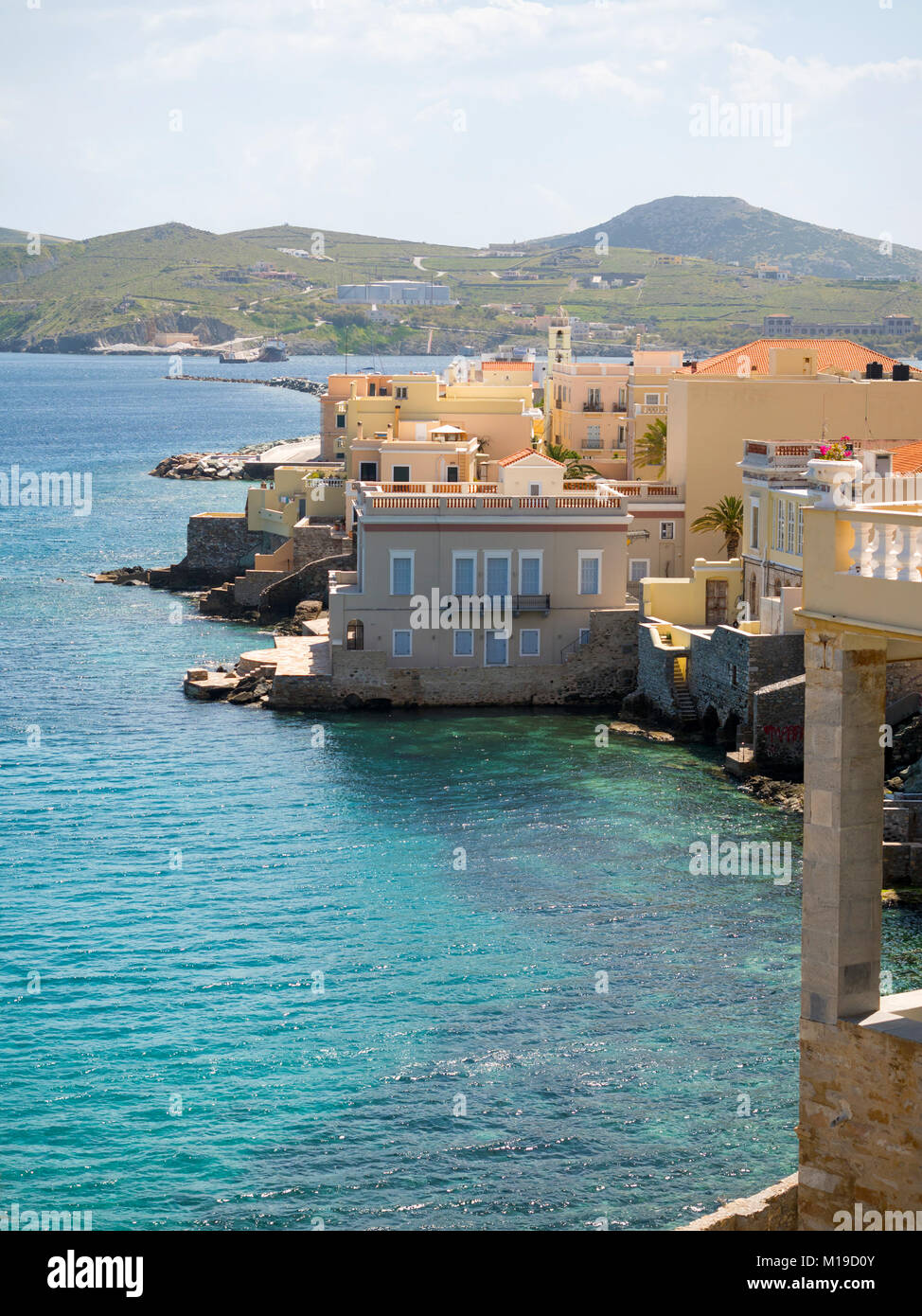 View of Syros town with beautiful buildings and houses in a sunny day ...