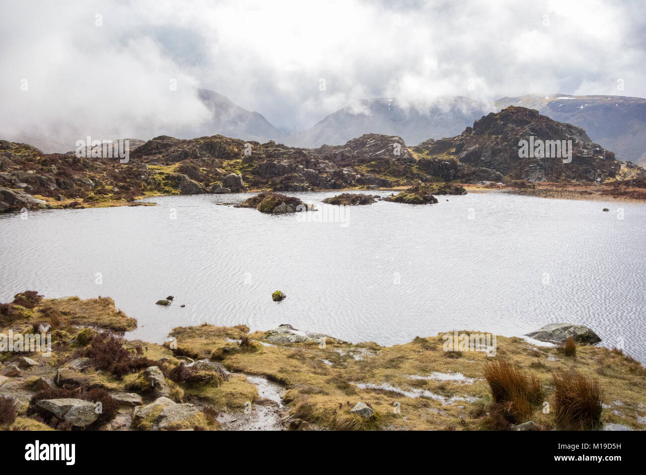 Innominate Tarn at the summit of Haystacks, where Alfred Wainwright's ...