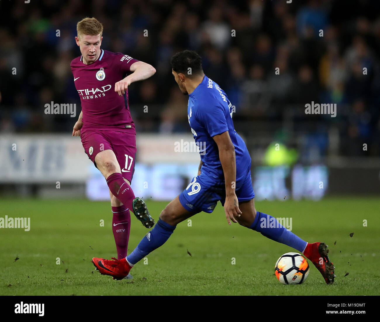 Manchester City's Kevin De Bruyne (left) and Cardiff City's Nathaniel ...