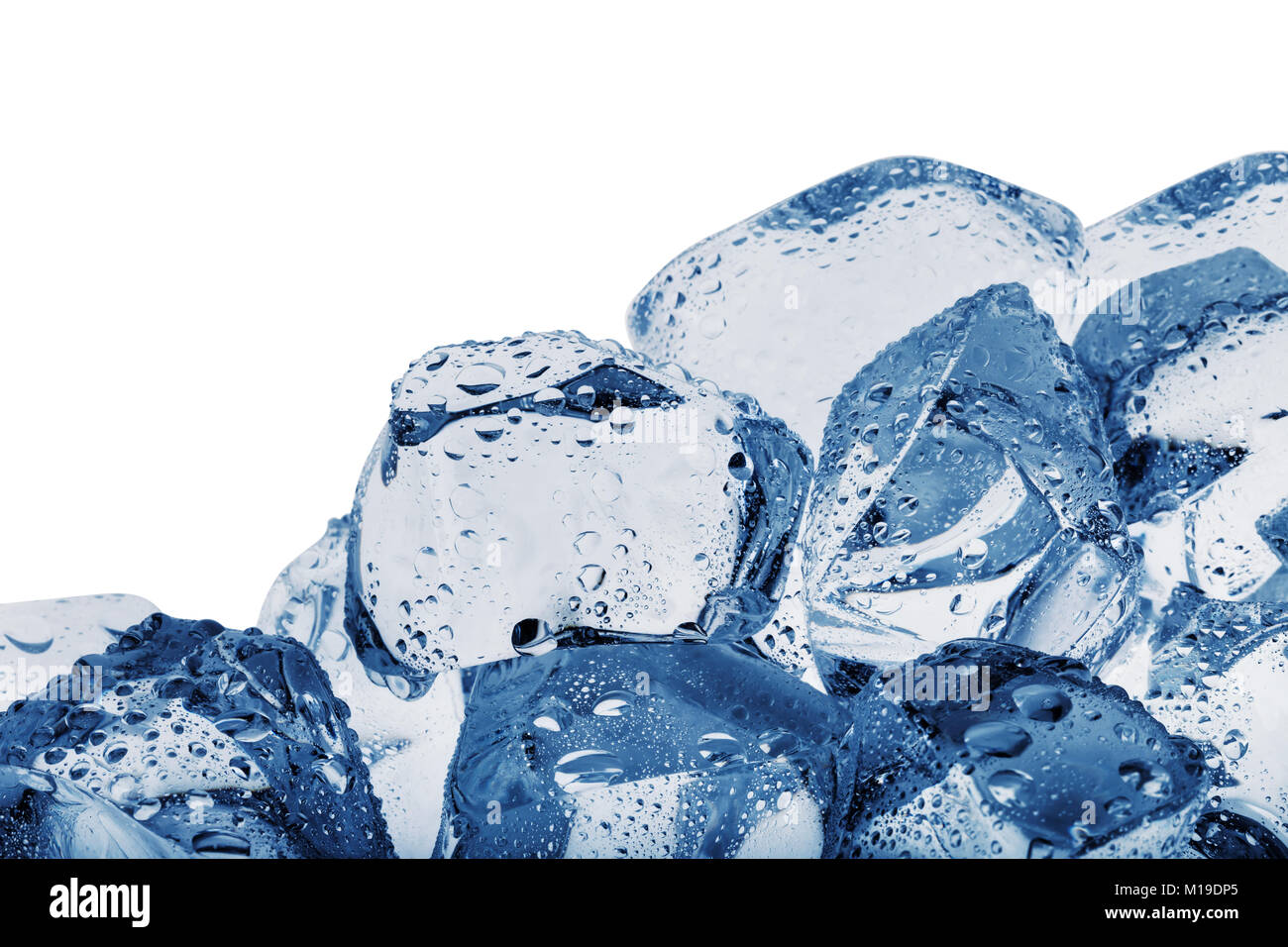 Crushed ice toned in blue isolated on white background Stock Photo - Alamy
