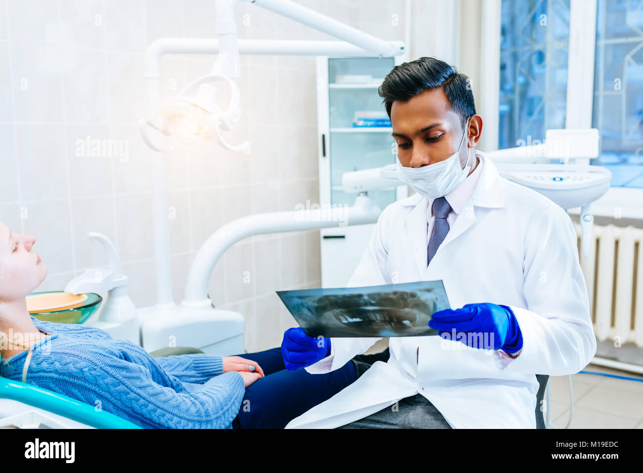 dental team checking teeth x ray of patient Stock Photo - Alamy
