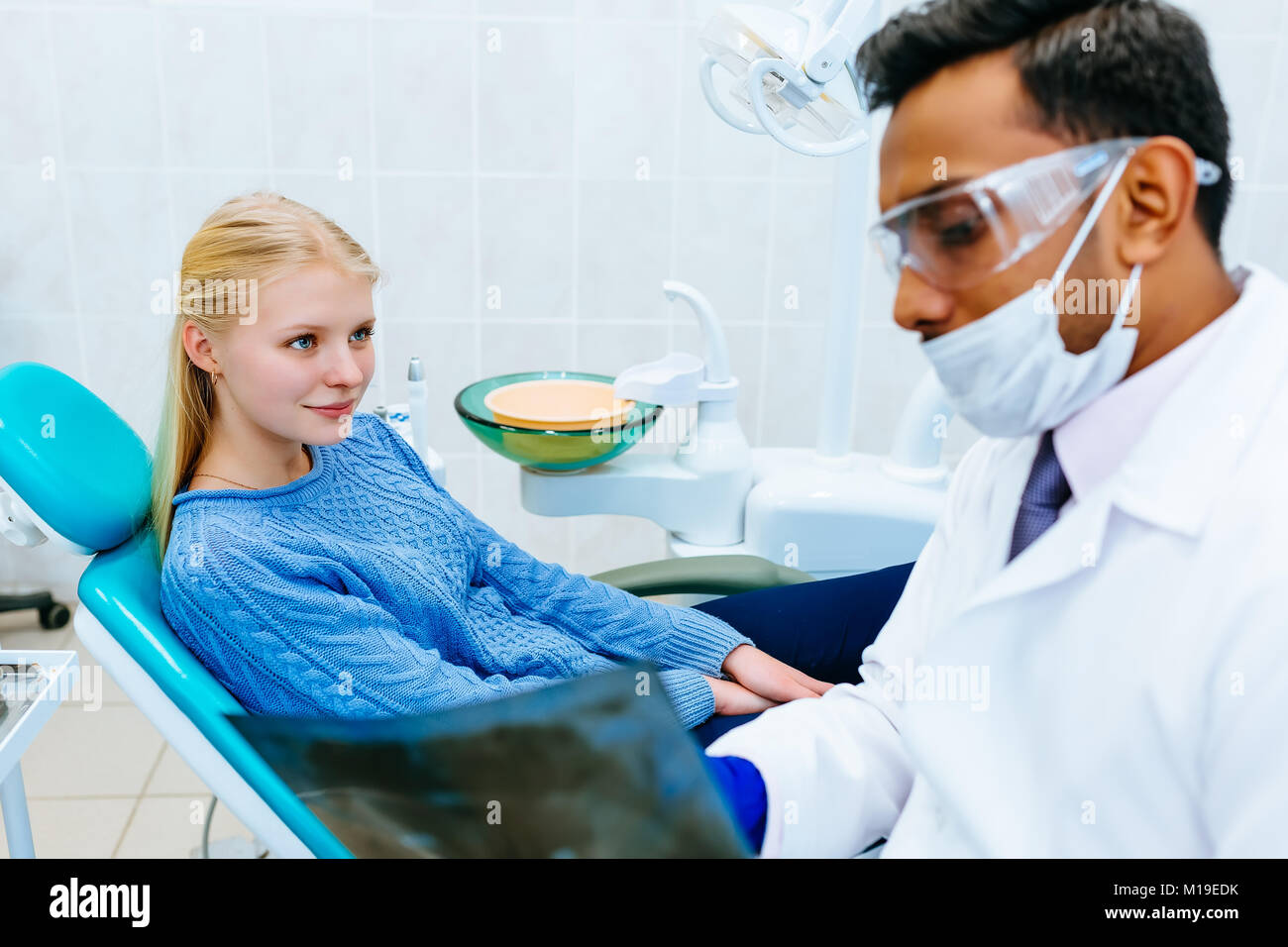 dental team checking teeth x ray of patient Stock Photo - Alamy