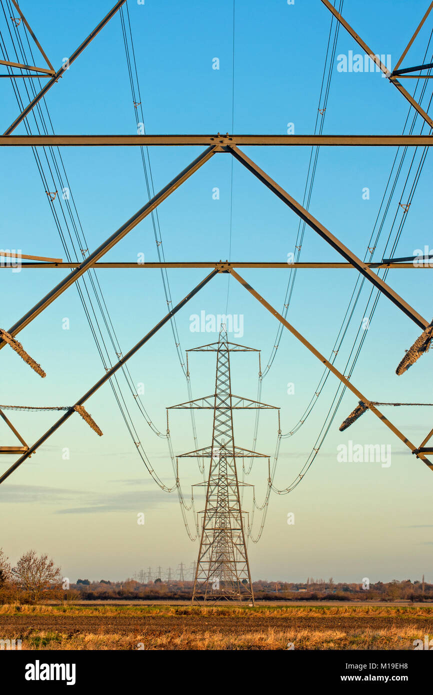 View along line of electricity pylons, Cambridgeshire Stock Photo - Alamy