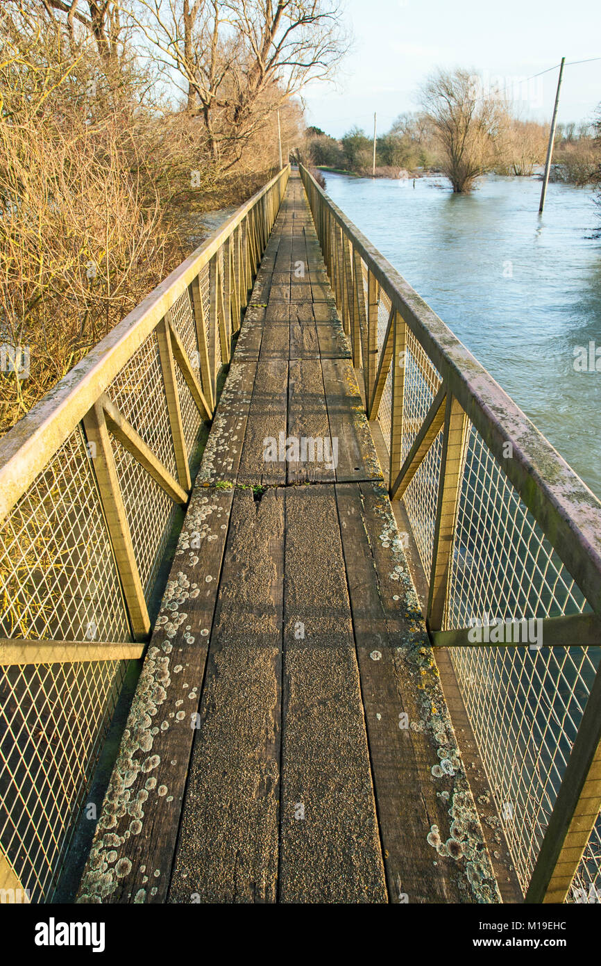 Foot bridge over the flooded Ouse Washes at Sutton Gault ...
