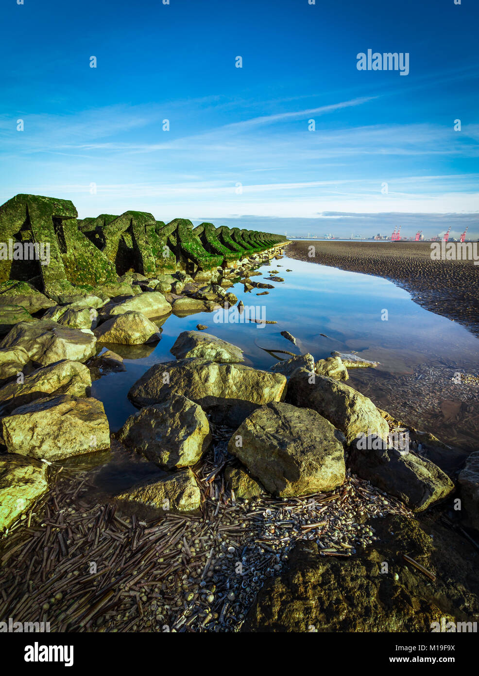 New Brighton beach wave breakers and sea defence system Stock Photo - Alamy