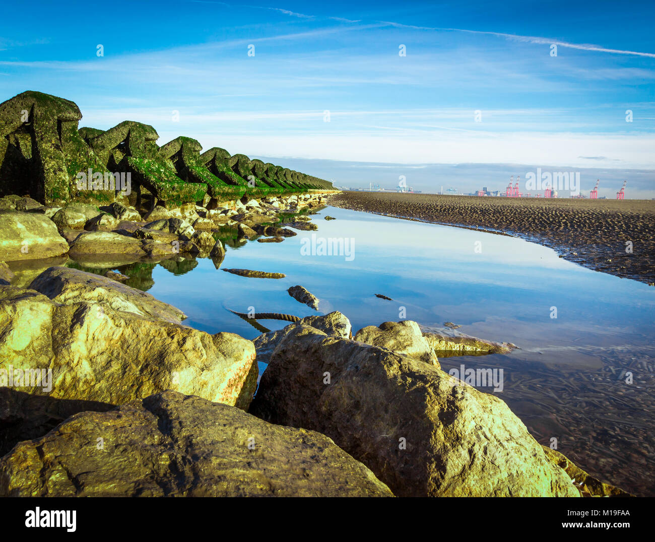 New Brighton beach wave breakers and sea defence system Stock Photo - Alamy