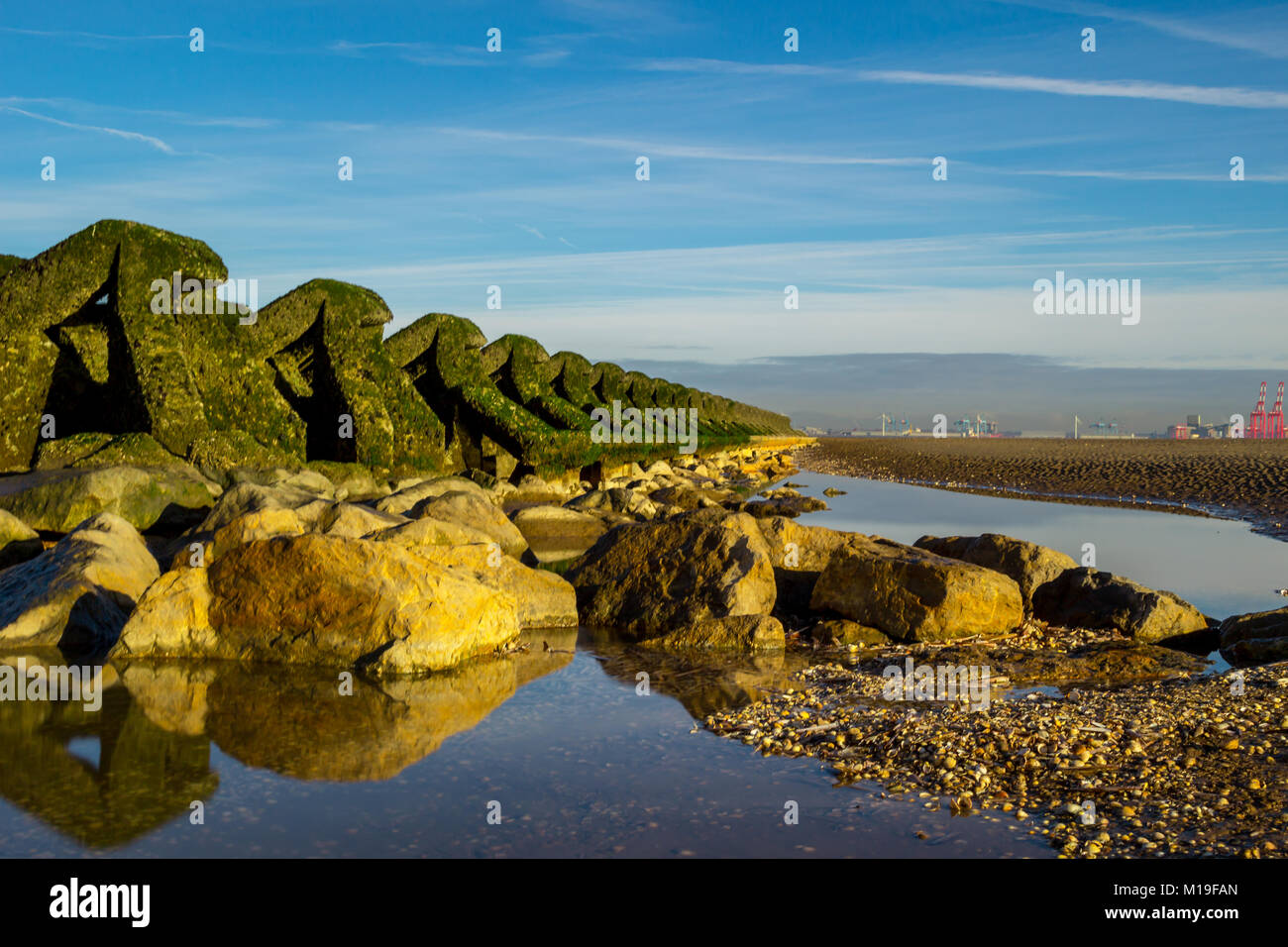 New Brighton beach wave breakers and sea defence system Stock Photo - Alamy