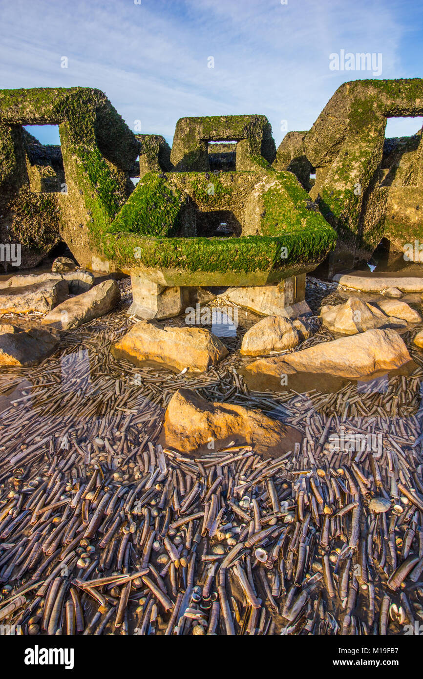 New Brighton beach wave breakers and sea defence system Stock Photo - Alamy