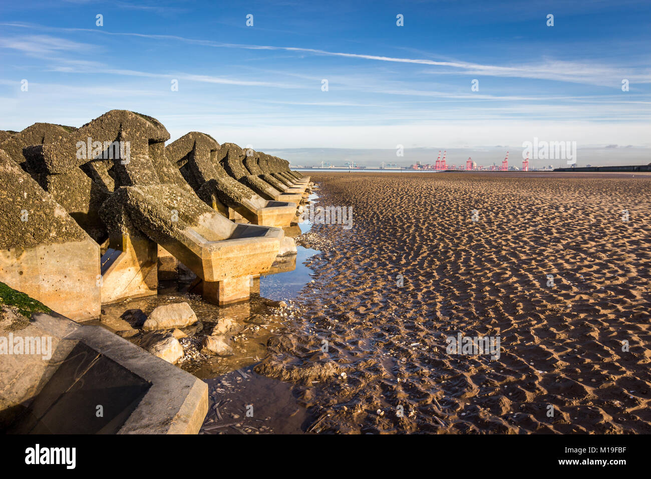 New Brighton beach wave breakers and sea defence system Stock Photo - Alamy