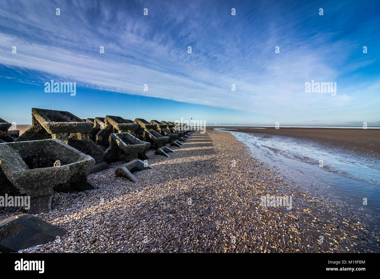 New Brighton beach wave breakers and sea defence system Stock Photo - Alamy