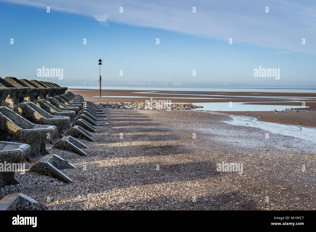 New Brighton beach wave breakers and sea defence system Stock Photo - Alamy
