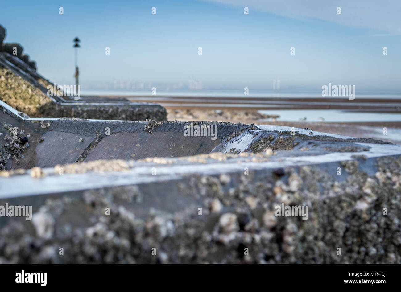 New Brighton beach wave breakers and sea defence system Stock Photo - Alamy