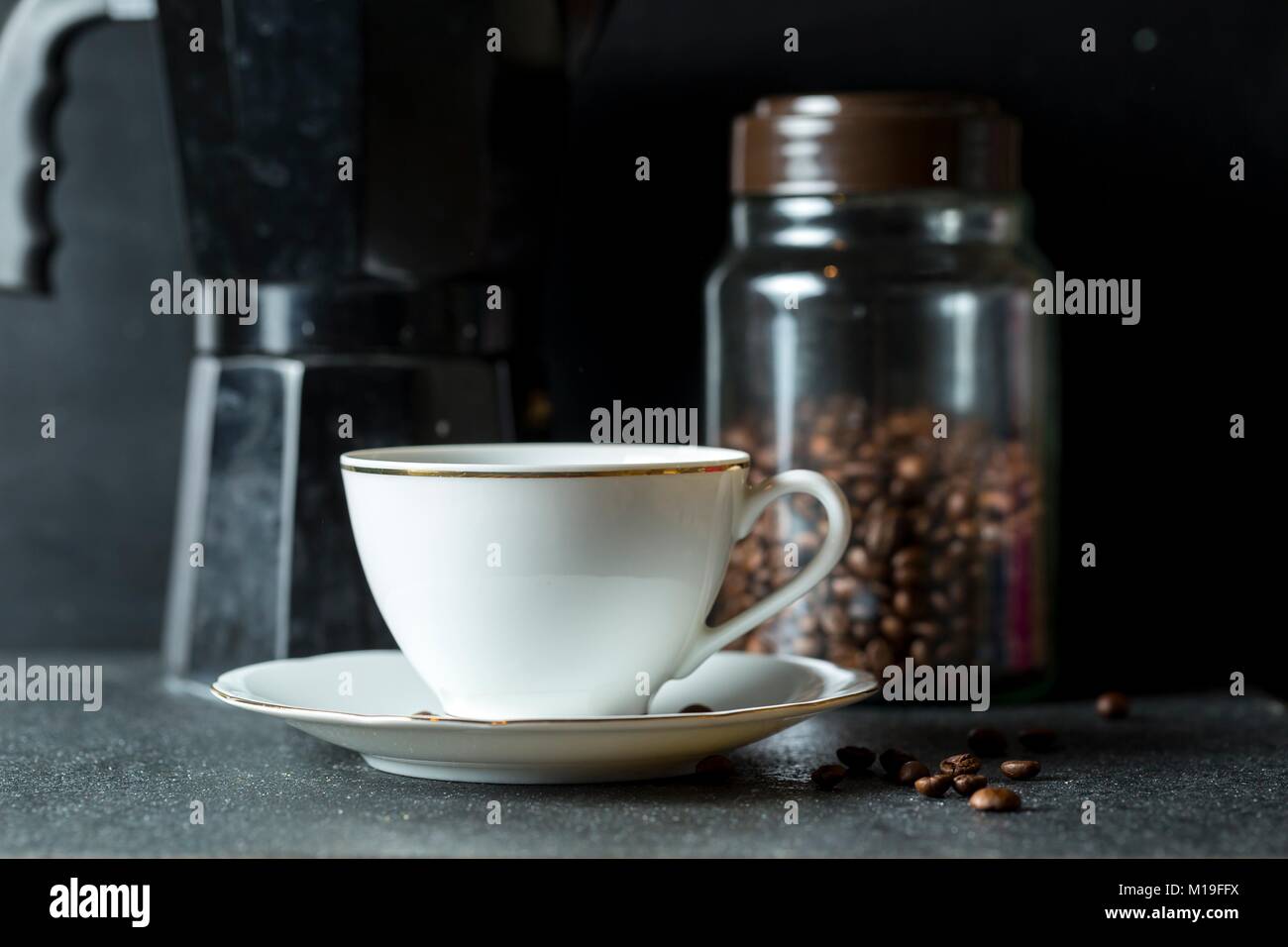 Coffee composition with tools for preparing espresso on dark background ...